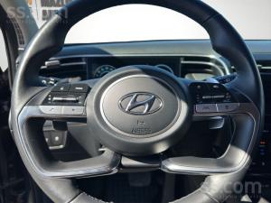 Blue Hyundai Tucson 2021 in Riga, with an engine capacity of 1.60 L and mileage of 69 thousand km for 21490 €, photo 11 on AUTOMOTO.COM.LV