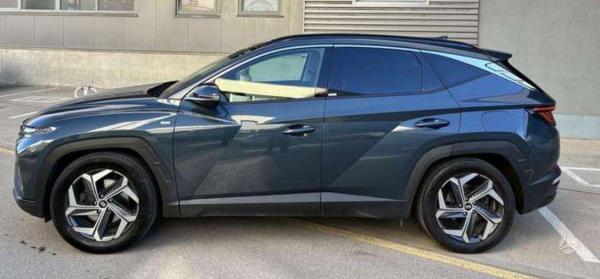 Blue Hyundai Tucson 2021 in Vilnius, with an engine capacity of 1.60 L and mileage of 63 thousand km for 22500 €, photo 7 on AUTOMOTO.COM.LV