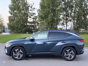 Blue Hyundai Tucson 2021 in Vilnius, with an engine capacity of 1.60 L and mileage of 63 thousand km for 18500 €, photo 8 on AUTOMOTO.COM.LV