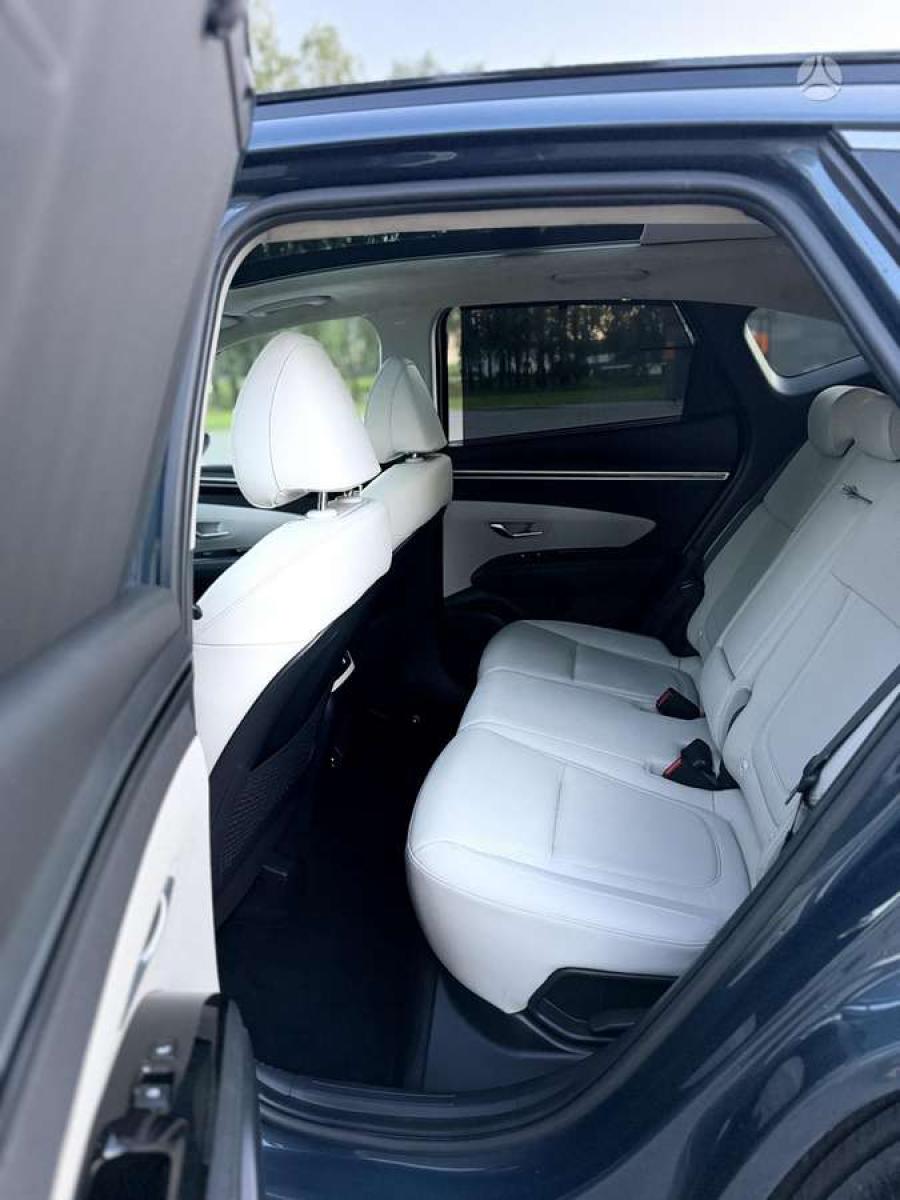 Blue Hyundai Tucson 2021 in Vilnius, with an engine capacity of 1.60 L and mileage of 63 thousand km for 18500 €, photo 19 on AUTOMOTO.COM.LV