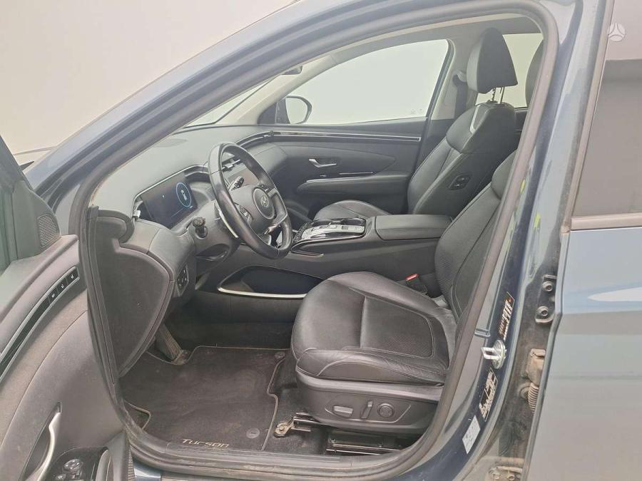 Blue Hyundai Tucson 2021 in Vilnius, with an engine capacity of 1.60 L and mileage of 88 thousand km for 24990 €, photo 7 on AUTOMOTO.COM.LV
