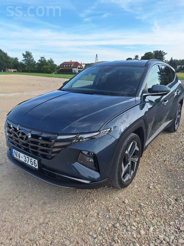 Blue Hyundai Tucson 2024 in Riga, with an engine capacity of 1.60 L and mileage of 58 thousand km for 28000 €, photo 2 on AUTOMOTO.COM.LV