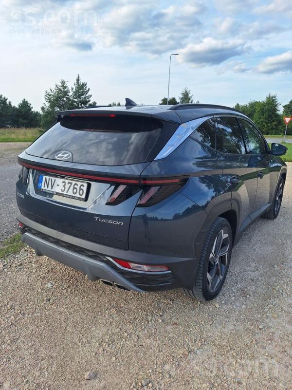 Blue Hyundai Tucson 2024 in Riga, with an engine capacity of 1.60 L and mileage of 58 thousand km for 28000 €, photo 5 on AUTOMOTO.COM.LV