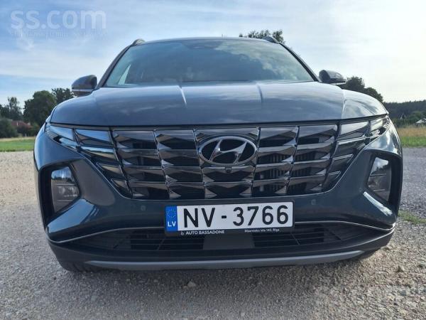 Blue Hyundai Tucson 2024 in Riga, with an engine capacity of 1.60 L and mileage of 58 thousand km for 28000 €, photo 7 on AUTOMOTO.COM.LV