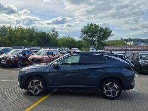Blue Hyundai Tucson 2024 in Vilnius, with an engine capacity of 1.60 L and mileage of 79 thousand km for 25900 €, photo 3 on AUTOMOTO.COM.LV