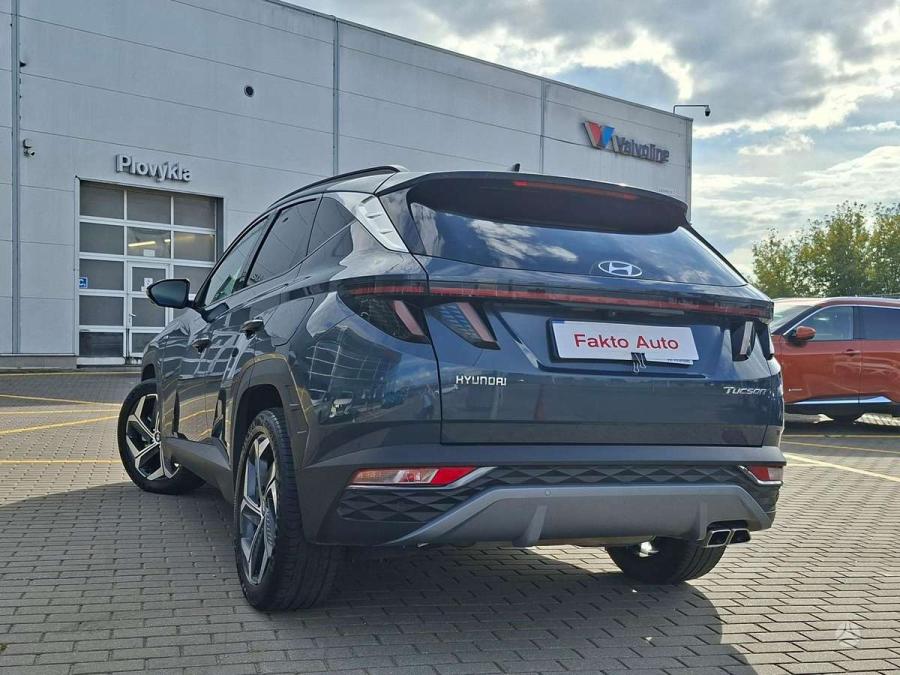 Blue Hyundai Tucson 2024 in Vilnius, with an engine capacity of 1.60 L and mileage of 79 thousand km for 25900 €, photo 4 on AUTOMOTO.COM.LV