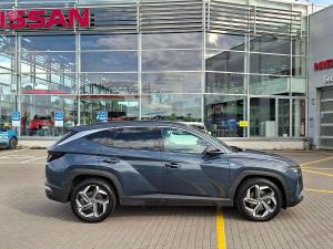 Blue Hyundai Tucson 2024 in Vilnius, with an engine capacity of 1.60 L and mileage of 79 thousand km for 25900 €, photo 6 on AUTOMOTO.COM.LV