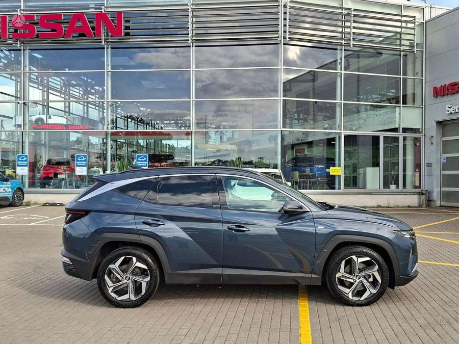 Blue Hyundai Tucson 2024 in Vilnius, with an engine capacity of 1.60 L and mileage of 79 thousand km for 25900 €, photo 6 on AUTOMOTO.COM.LV