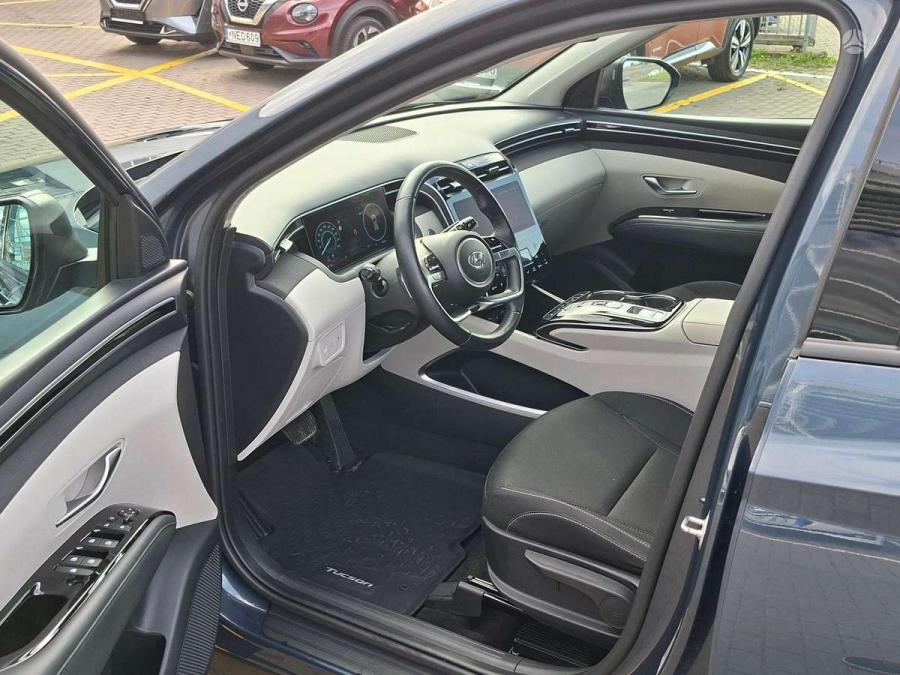 Blue Hyundai Tucson 2024 in Vilnius, with an engine capacity of 1.60 L and mileage of 79 thousand km for 25900 €, photo 8 on AUTOMOTO.COM.LV