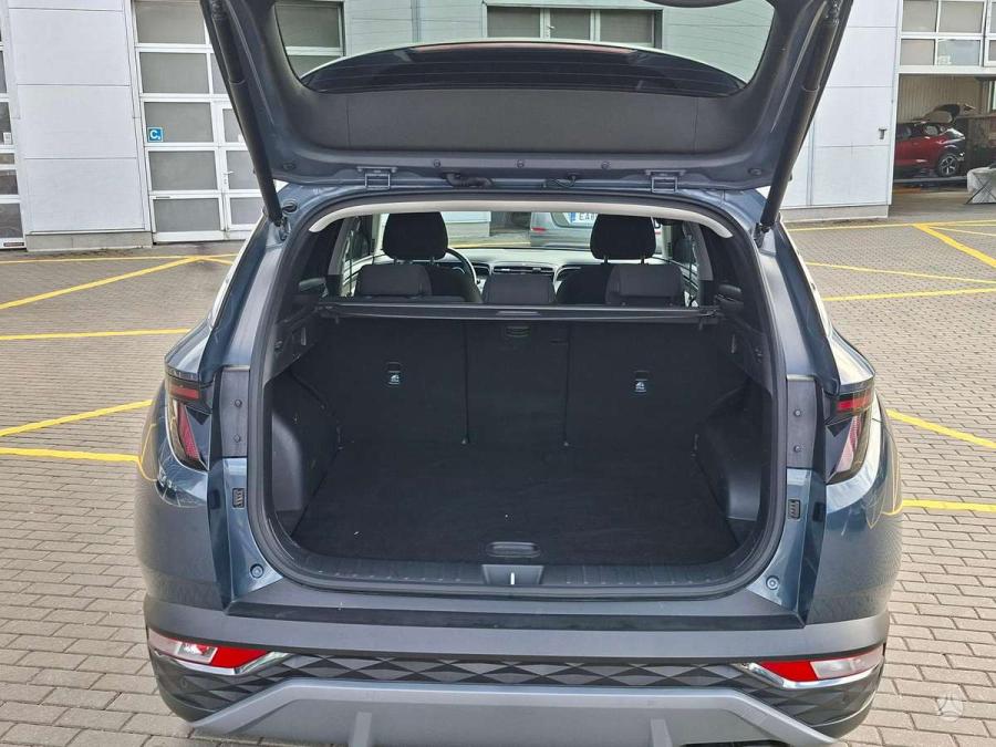 Blue Hyundai Tucson 2024 in Vilnius, with an engine capacity of 1.60 L and mileage of 79 thousand km for 25900 €, photo 23 on AUTOMOTO.COM.LV