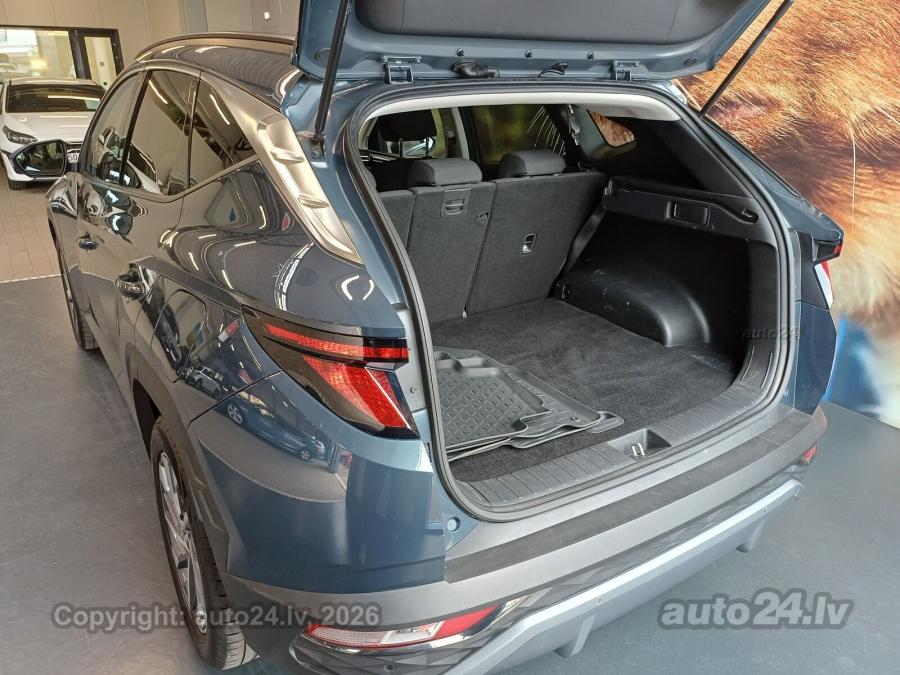 Blue Hyundai Tucson 2021 in Tallinn, with an engine capacity of 1.60 L and mileage of 99 thousand km for 17900 €, photo 5 on AUTOMOTO.COM.LV
