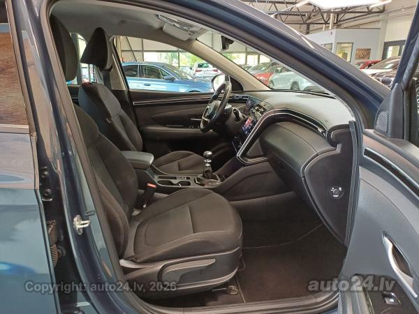 Blue Hyundai Tucson 2021 in Tallinn, with an engine capacity of 1.60 L and mileage of 99 thousand km for 17900 €, photo 5 on AUTOMOTO.COM.LV