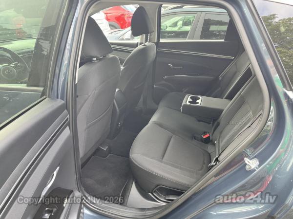 Blue Hyundai Tucson 2021 in Tallinn, with an engine capacity of 1.60 L and mileage of 99 thousand km for 17900 €, photo 6 on AUTOMOTO.COM.LV
