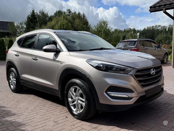 Brown Hyundai Tucson 2015 in Utena, with an engine capacity of 1.69 L and mileage of 237 thousand km for 8950 €, photo 6 on AUTOMOTO.COM.LV