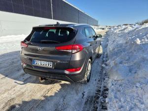 Brown Hyundai Tucson 2016 in Panevezys, with an engine capacity of 1.69 L and mileage of 253 thousand km for 11200 €, photo 12 on AUTOMOTO.COM.LV