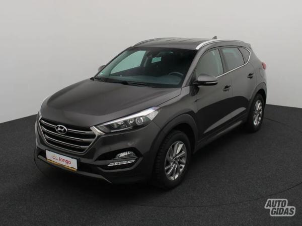 Brown Hyundai Tucson 2016 in Vilnius, with an engine capacity of 1.60 L and mileage of 194 thousand km for 11299 €, photo 1 on AUTOMOTO.COM.LV