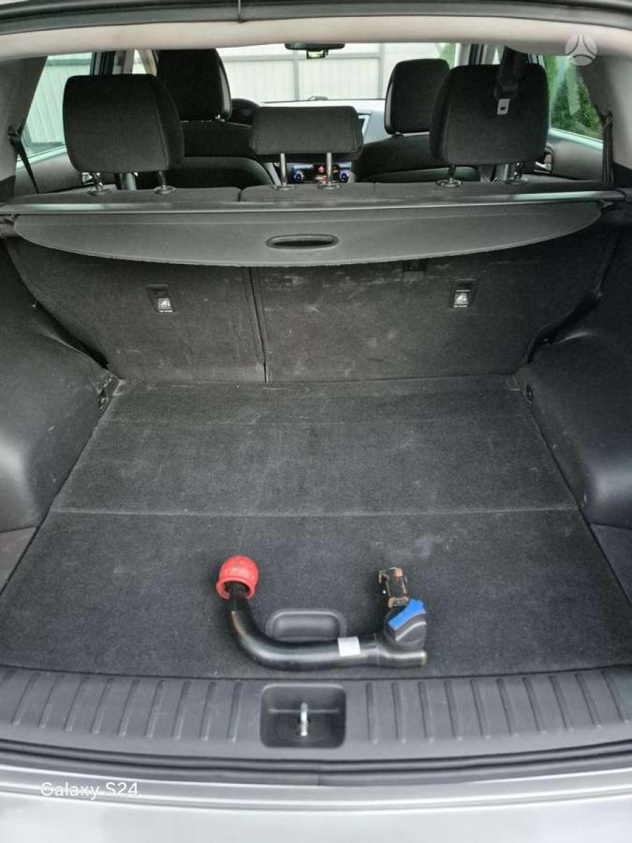 Brown Hyundai Tucson 2017 in Kaunas, with an engine capacity of 1.69 L and mileage of 161 thousand km for 11900 €, photo 6 on AUTOMOTO.COM.LV