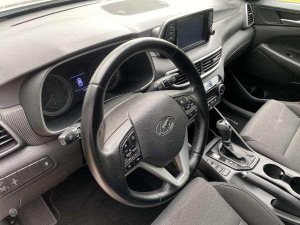 Brown Hyundai Tucson 2018 in Vilnius, with an engine capacity of 1.60 L and mileage of 139 thousand km for 13400 €, photo 9 on AUTOMOTO.COM.LV