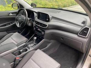 Brown Hyundai Tucson 2018 in Vilnius, with an engine capacity of 1.60 L and mileage of 139 thousand km for 13400 €, photo 18 on AUTOMOTO.COM.LV