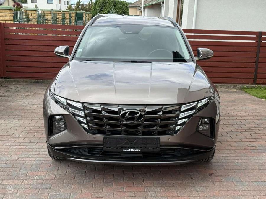 Brown Hyundai Tucson 2021 in Siauliai, with an engine capacity of 1.60 L and mileage of 156 thousand km for 19390 €, photo 3 on AUTOMOTO.COM.LV