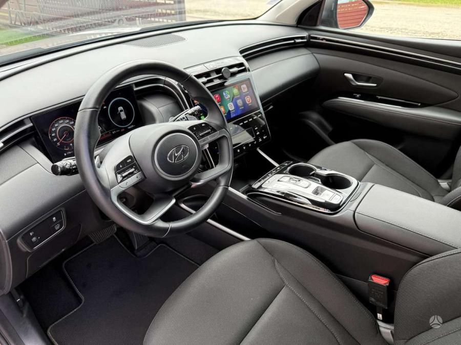 Brown Hyundai Tucson 2021 in Siauliai, with an engine capacity of 1.60 L and mileage of 156 thousand km for 19390 €, photo 10 on AUTOMOTO.COM.LV