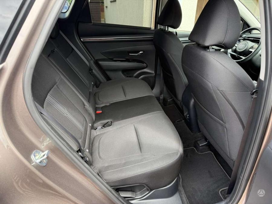 Brown Hyundai Tucson 2021 in Siauliai, with an engine capacity of 1.60 L and mileage of 156 thousand km for 19390 €, photo 19 on AUTOMOTO.COM.LV