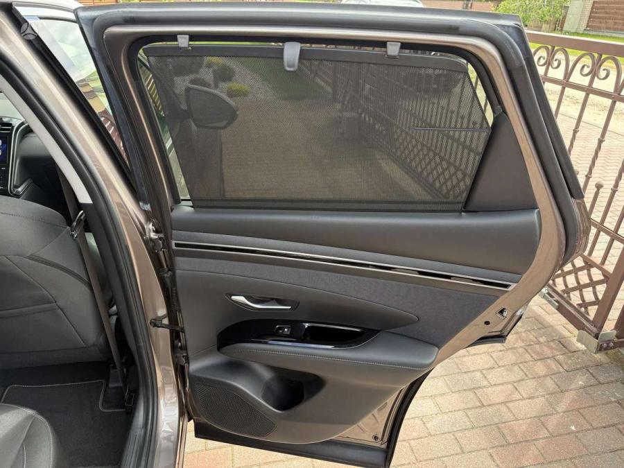 Brown Hyundai Tucson 2021 in Siauliai, with an engine capacity of 1.60 L and mileage of 156 thousand km for 19390 €, photo 20 on AUTOMOTO.COM.LV