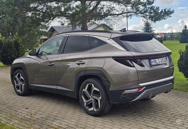 Brown Hyundai Tucson 2021 in Klaipeda, with an engine capacity of 1.60 L and mileage of 248 thousand km for 16900 €, photo 10 on AUTOMOTO.COM.LV