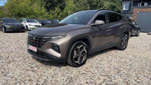 Brūns Hyundai Tucson 2021 Kauņa, ar dzinēja tilpumu 1.60 L un nobraukumu 100 tūkst. km par 22300 €, foto  vietnē AUTOMOTO.COM.LV