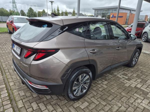 Hyundai Tucson 2021 Liepāja vietnē Brūns Hyundai Tucson 2021 Liepāja, ar dzinēja tilpumu 1.60 L un nobraukumu 30 tūkst. km par 16990 €, foto 6 vietnē AUTOMOTO.COM.LV