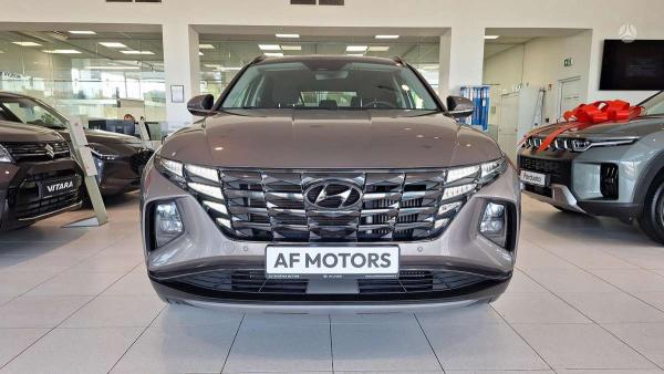 Hyundai Tucson 2021 KauÅa vietnÄ BrÅ«ns Hyundai Tucson 2021 KauÅa, ar dzinÄja tilpumu 0.00 L un nobraukumu 91 tÅ«kst. km par 21886 ā¬, foto 7 vietnÄ AUTOMOTO.COM.LV