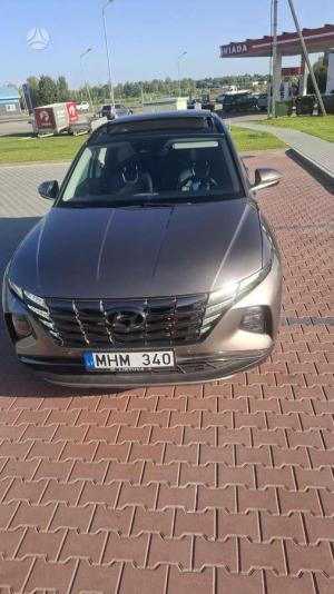 Brūns Hyundai Tucson 2021 Kauņa, ar dzinēja tilpumu 1.60 L un nobraukumu 59 tūkst. km par 23000 €, foto  vietnē AUTOMOTO.COM.LV