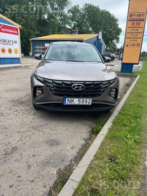 Brown Hyundai Tucson 2023 in Riga, with an engine capacity of 1.60 L and mileage of 65 thousand km for 15700 €, photo  on AUTOMOTO.COM.LV