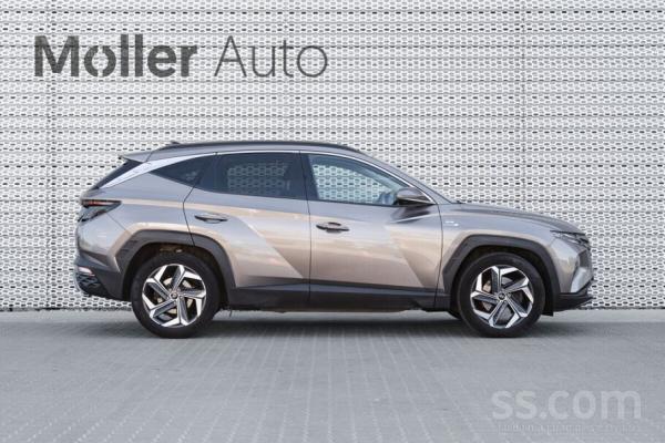 Brown Hyundai Tucson 2023 in Riga, with an engine capacity of 1.60 L and mileage of 113 thousand km for 29650 €, photo 5 on AUTOMOTO.COM.LV