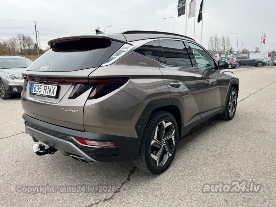 Brown Hyundai Tucson 2021 in Tartu, with an engine capacity of 1.60 L and mileage of 75 thousand km for 21000 €, photo 2 on AUTOMOTO.COM.LV