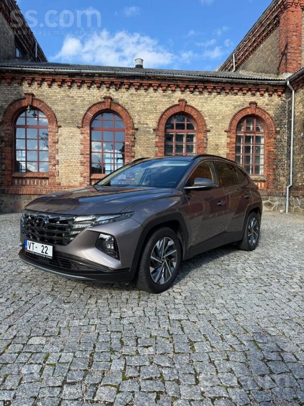 Brown Hyundai Tucson 2023 in Ventspils, with an engine capacity of 1.60 L and mileage of 68 thousand km for 21900 €, photo 5 on AUTOMOTO.COM.LV