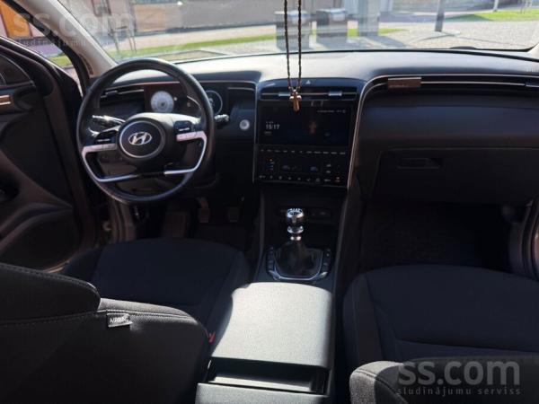 Brown Hyundai Tucson 2023 in Ventspils, with an engine capacity of 1.60 L and mileage of 68 thousand km for 21900 €, photo 7 on AUTOMOTO.COM.LV