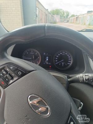 Brown Hyundai Tucson 2015 in Panevezys, with an engine capacity of 2.00 L and mileage of 178 thousand km for 107000 €, photo 5 on AUTOMOTO.COM.LV