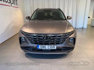 Brūns Hyundai Tucson 2022 Tallina, ar dzinēja tilpumu 1.60 L un nobraukumu 126 tūkst. km par 20490 €, foto 3 vietnē AUTOMOTO.COM.LV