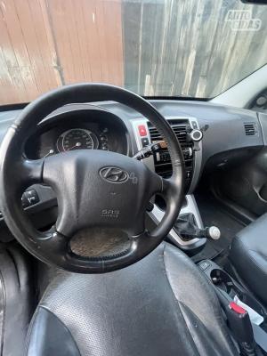 Hyundai Tucson 2006 in Vilnius, with an engine capacity of 2.00 L and mileage of 257 thousand km for 2200 €, photo 8 on AUTOMOTO.COM.LV