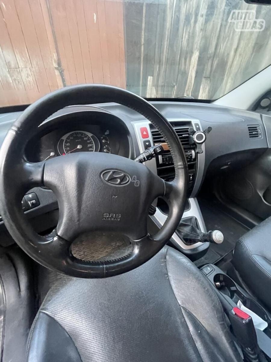 Hyundai Tucson 2006 in Vilnius, with an engine capacity of 2.00 L and mileage of 257 thousand km for 2200 €, photo 8 on AUTOMOTO.COM.LV