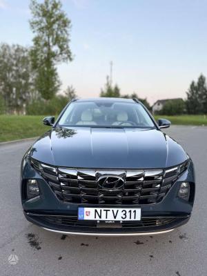 Green Hyundai Tucson 2021 in Vilnius, with an engine capacity of 1.60 L and mileage of 63 thousand km for 18900 €, photo 3 on AUTOMOTO.COM.LV