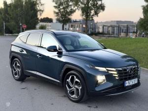 Green Hyundai Tucson 2021 in Vilnius, with an engine capacity of 1.60 L and mileage of 63 thousand km for 18900 €, photo 4 on AUTOMOTO.COM.LV