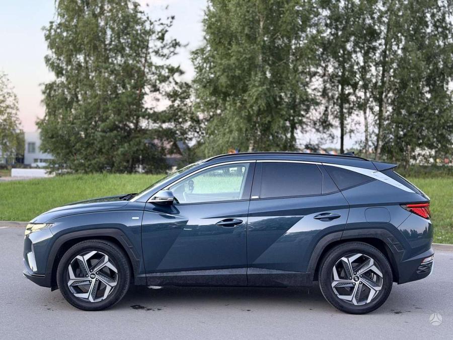 Green Hyundai Tucson 2021 in Vilnius, with an engine capacity of 1.60 L and mileage of 63 thousand km for 18900 €, photo 8 on AUTOMOTO.COM.LV