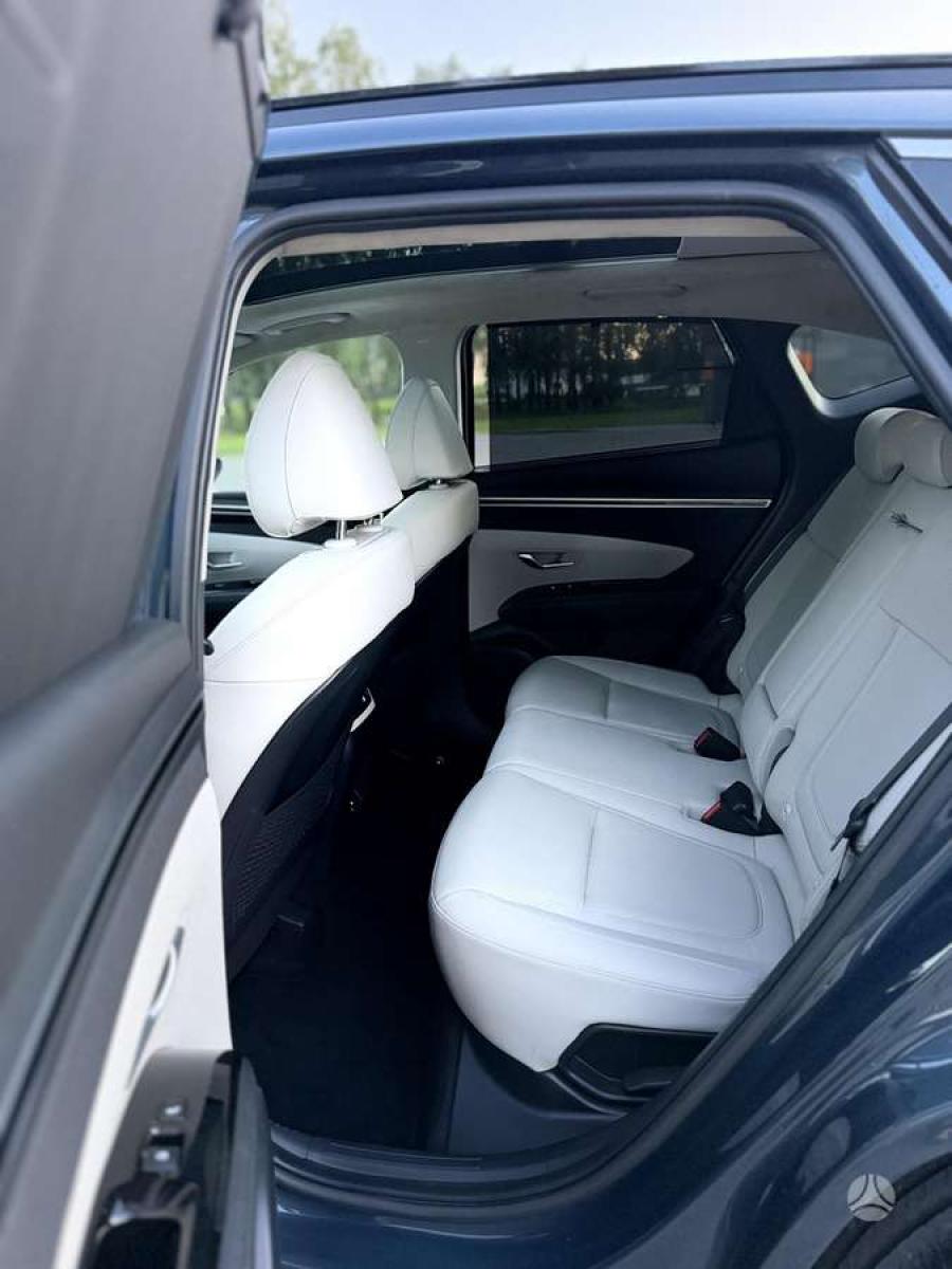 Green Hyundai Tucson 2021 in Vilnius, with an engine capacity of 1.60 L and mileage of 63 thousand km for 18900 €, photo 17 on AUTOMOTO.COM.LV