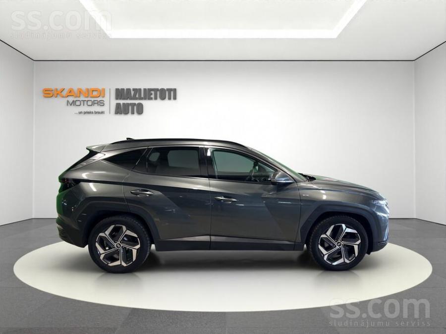Green Hyundai Tucson 2021 in Riga, with an engine capacity of 1.60 L and mileage of 144 thousand km for 19790 €, photo 8 on AUTOMOTO.COM.LV