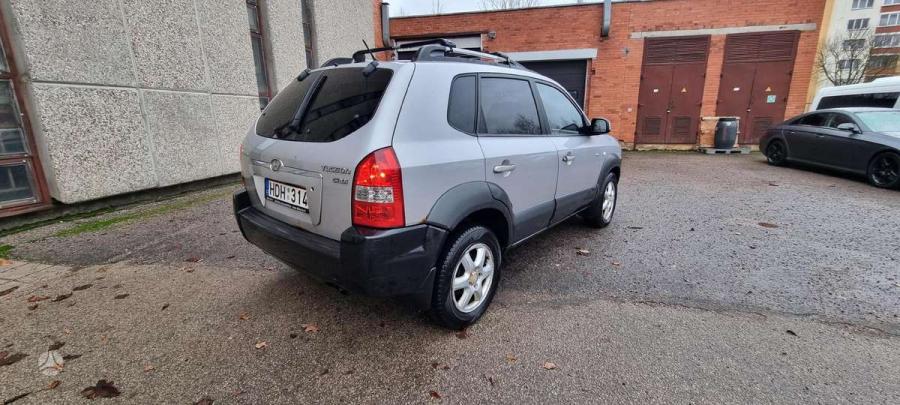 Grey Hyundai Tucson 2004 in Panevezys, with an engine capacity of 1.99 L and mileage of 300 thousand km for 1850 €, photo 12 on AUTOMOTO.COM.LV