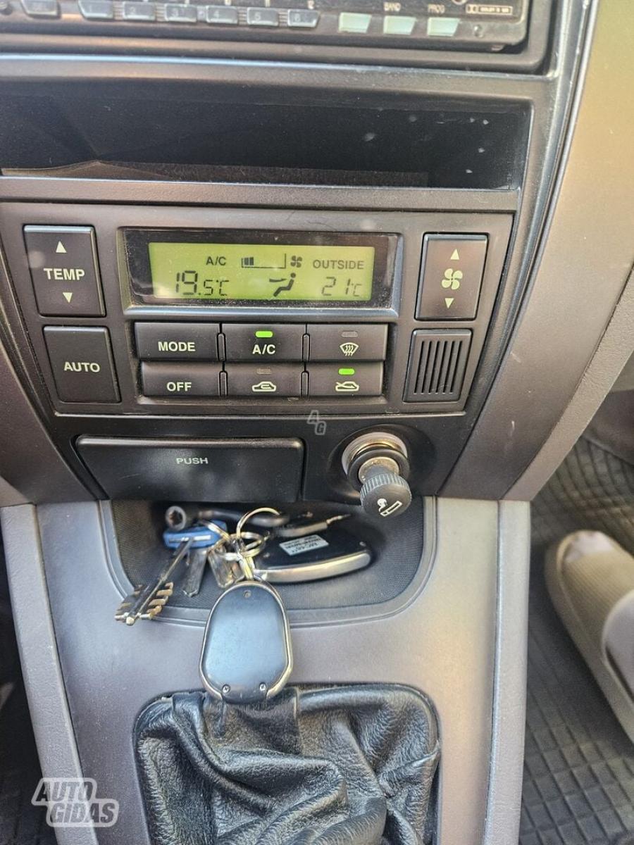 Grey Hyundai Tucson 2004 in Vilkaviskis, with an engine capacity of 2.00 L and mileage of 295 thousand km for 2100 €, photo 10 on AUTOMOTO.COM.LV