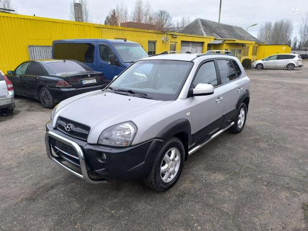 Grey Hyundai Tucson 2005 in Siauliai, with an engine capacity of 2.00 L and mileage of 156 thousand km for 3650 €, photo 4 on AUTOMOTO.COM.LV