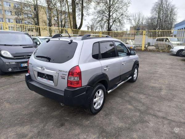 Grey Hyundai Tucson 2005 in Siauliai, with an engine capacity of 2.00 L and mileage of 156 thousand km for 3650 €, photo 5 on AUTOMOTO.COM.LV